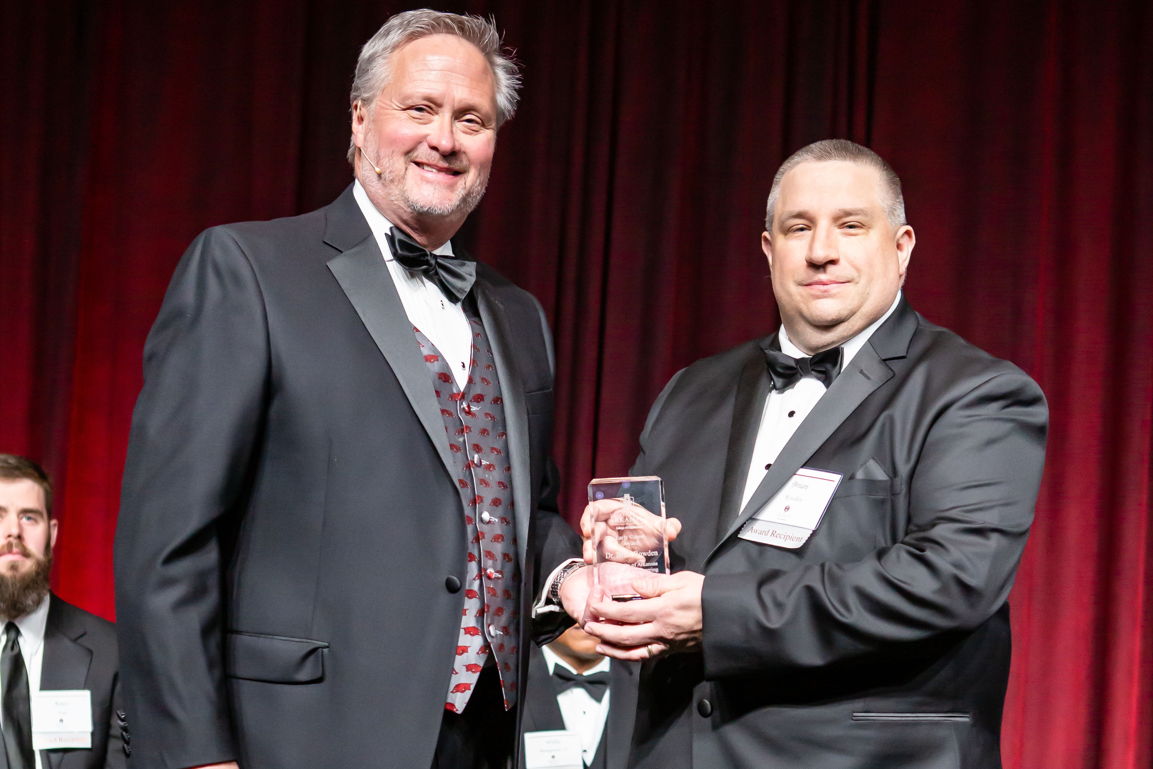 Brian Rowden receives the “Early Career Award” from the University of ...