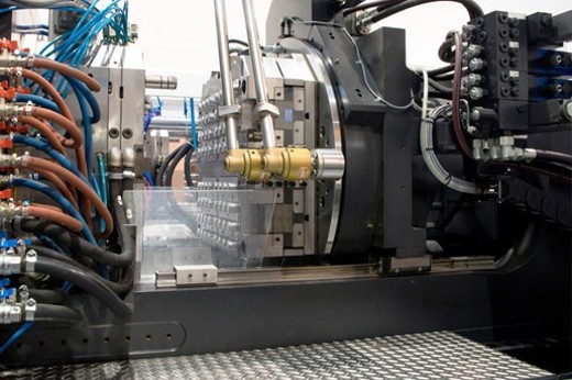 Reducing cost and increasing output for injection molding machines ...